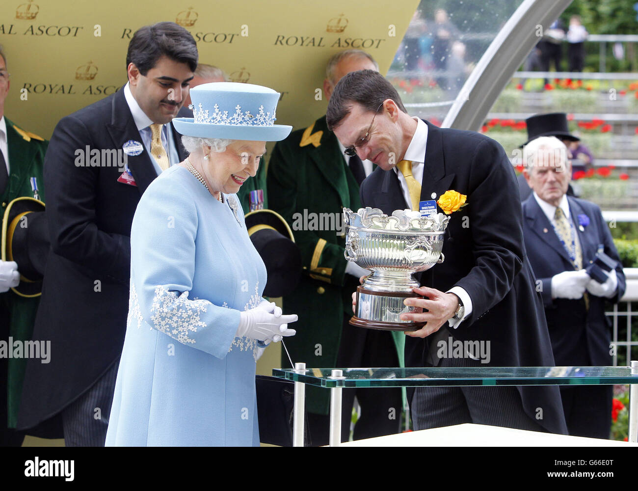 Queen Elizabeth II presents the leading trainer trophy to Aidan O'Brien ...