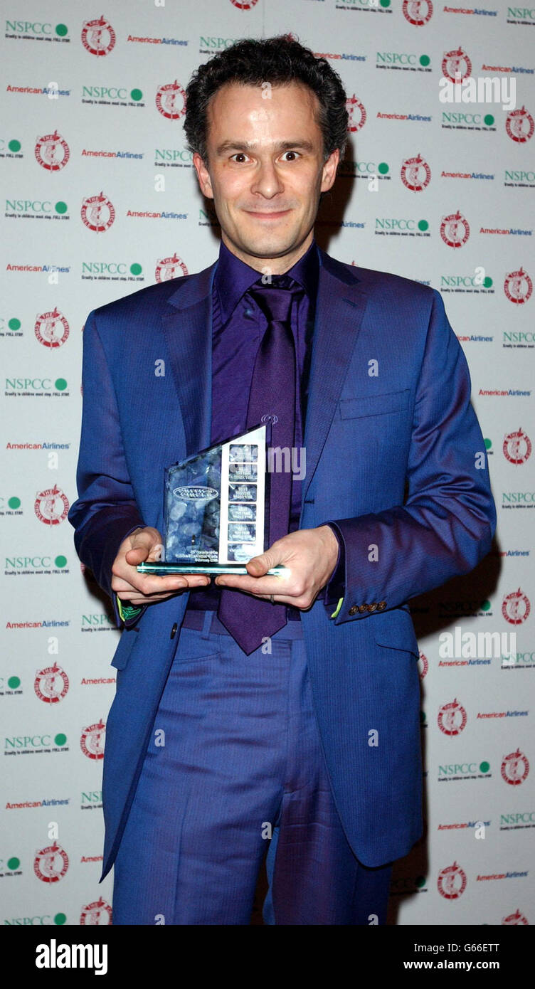 Composer Peter Juylian poses with the award for Best British director ...