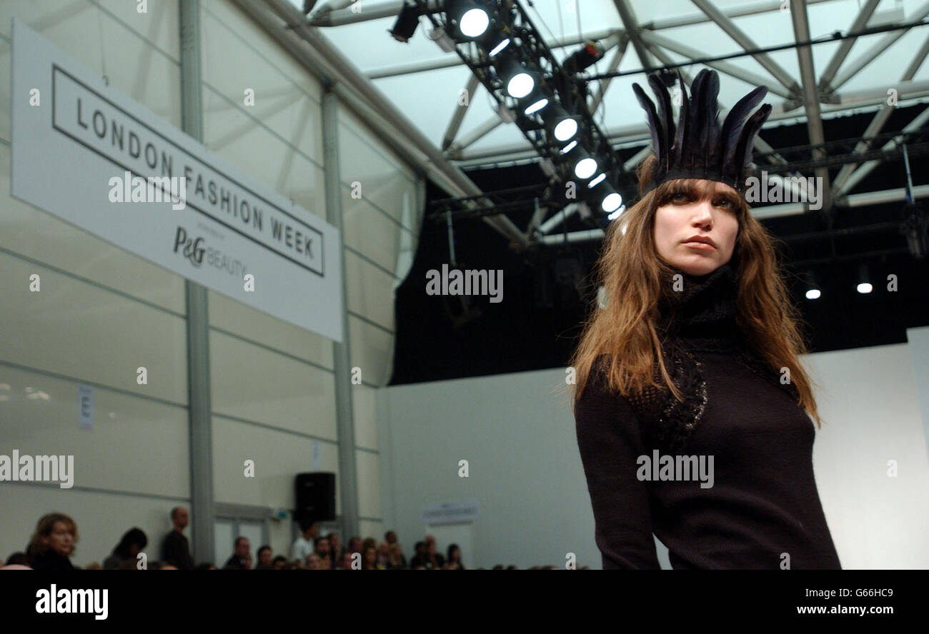 A model wears a design by fashion designer John Rocha during his autumn ...