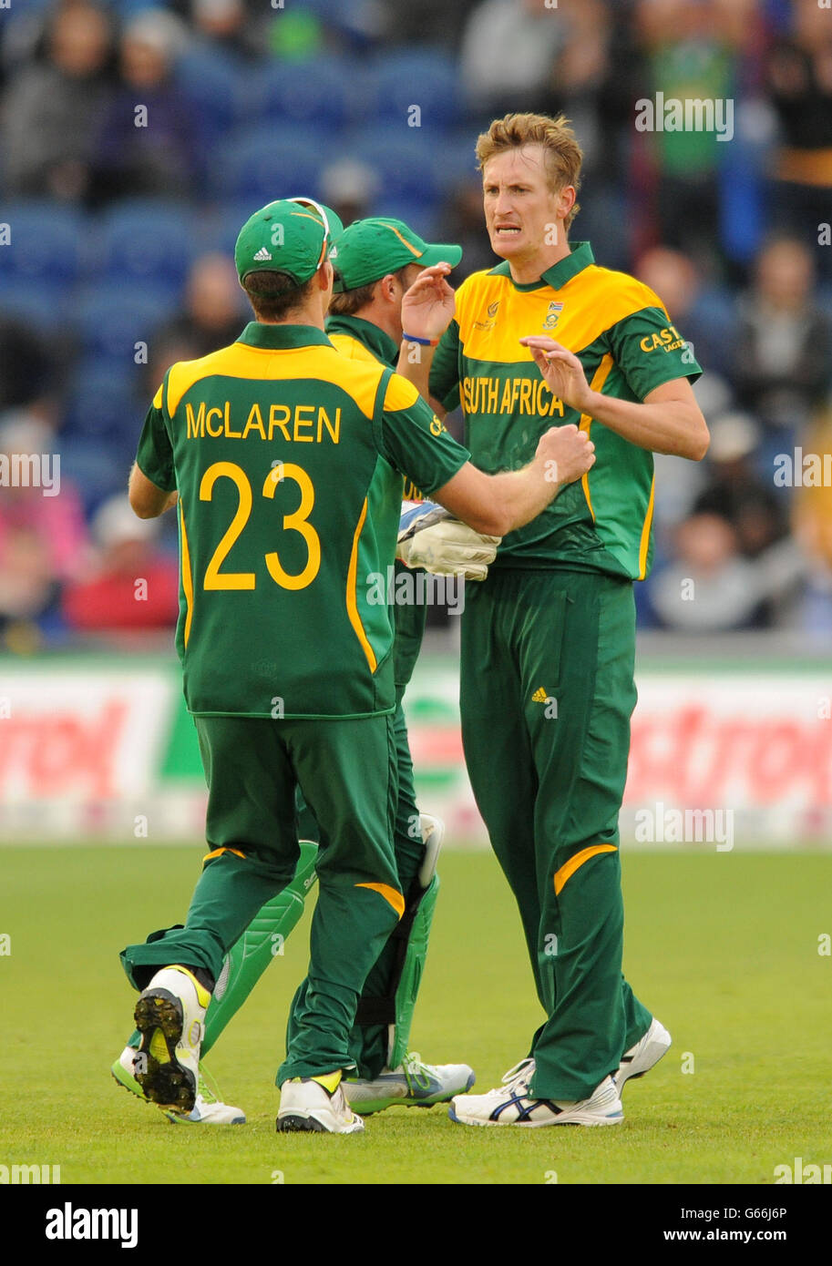 South Africa's Chris Morris (right) celebrates taking the wicket of ...