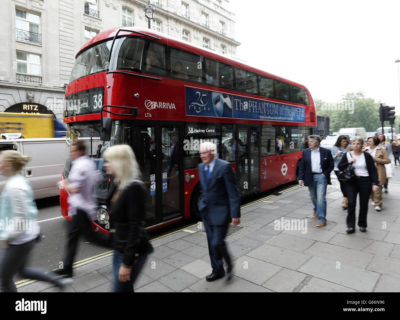 The new Routemaster bus used on the 38 route passes The Ritz Hotel on ...