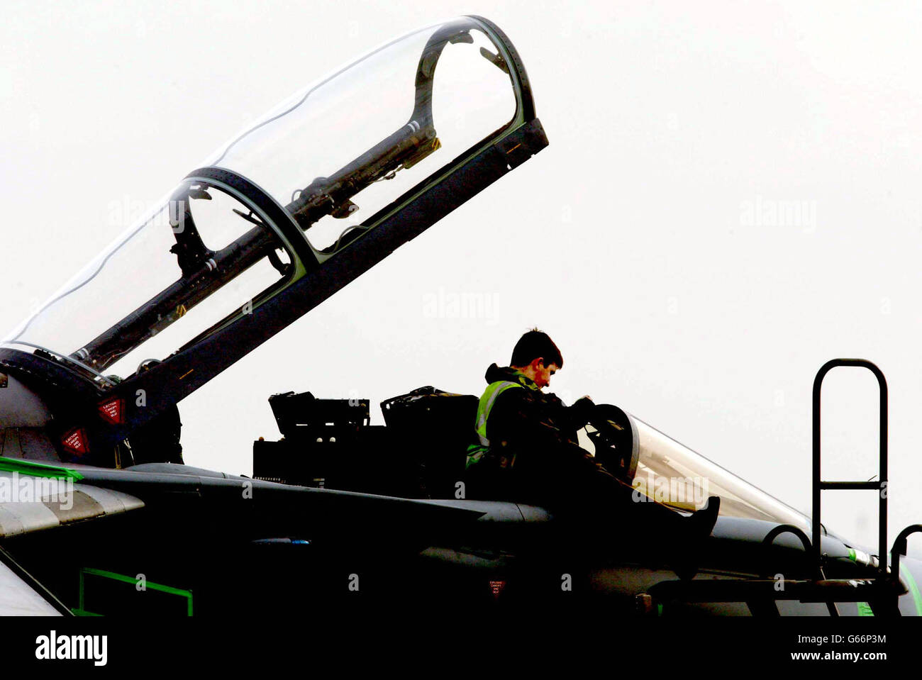 A member of the groundstaff at RAF Marham, Norfolk, inspects the ...