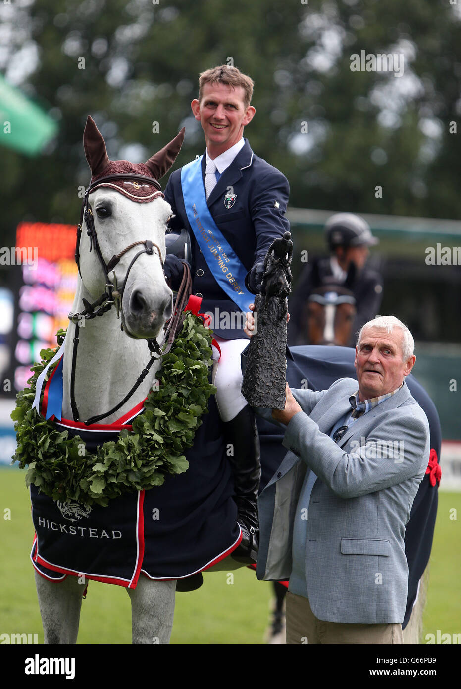 Harvey Smith presents Great Britain's Phillip Miller riding Caritiar Z ...