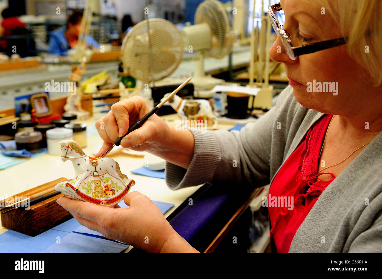 Julie Scott puts the final touches on a Rocking Horse, a souvenir to ...