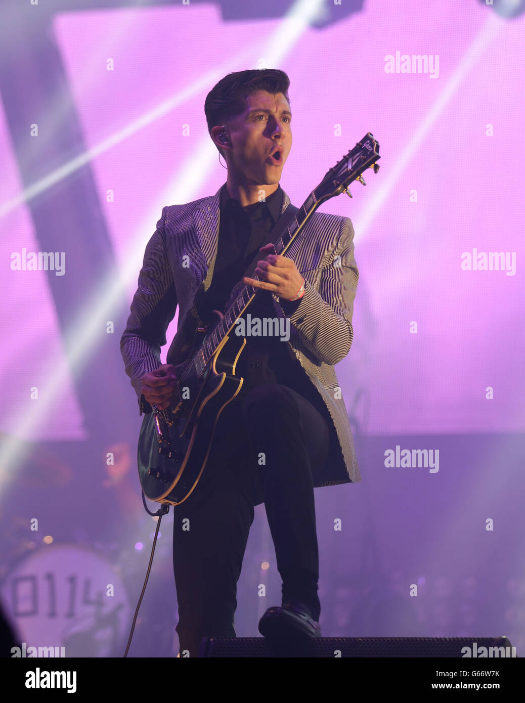 Alex Turner of the Artic Monkeys performing on the Pyramid Stage ...