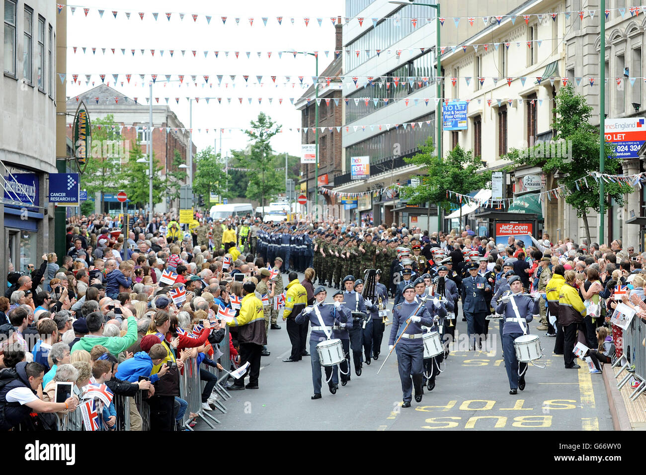Members of the Armed Forces parade through the city centre during Armed ...