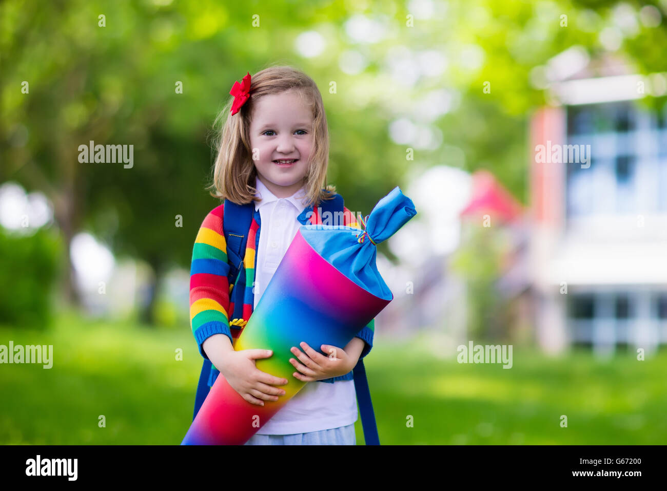 Happy child holding traditional German candy cone on first school day ...