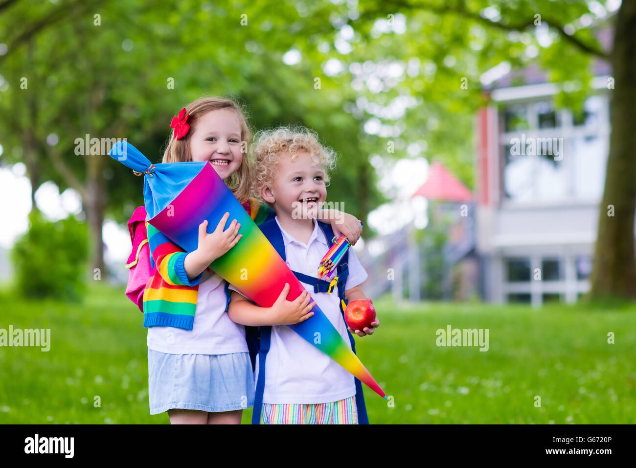 Happy child holding traditional German candy cone on first school day ...