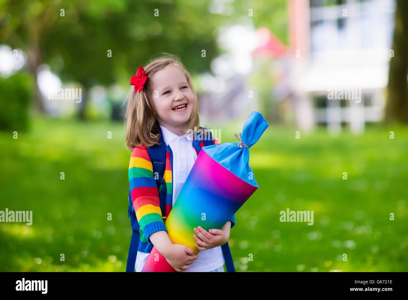Happy child holding traditional German candy cone on first school day ...