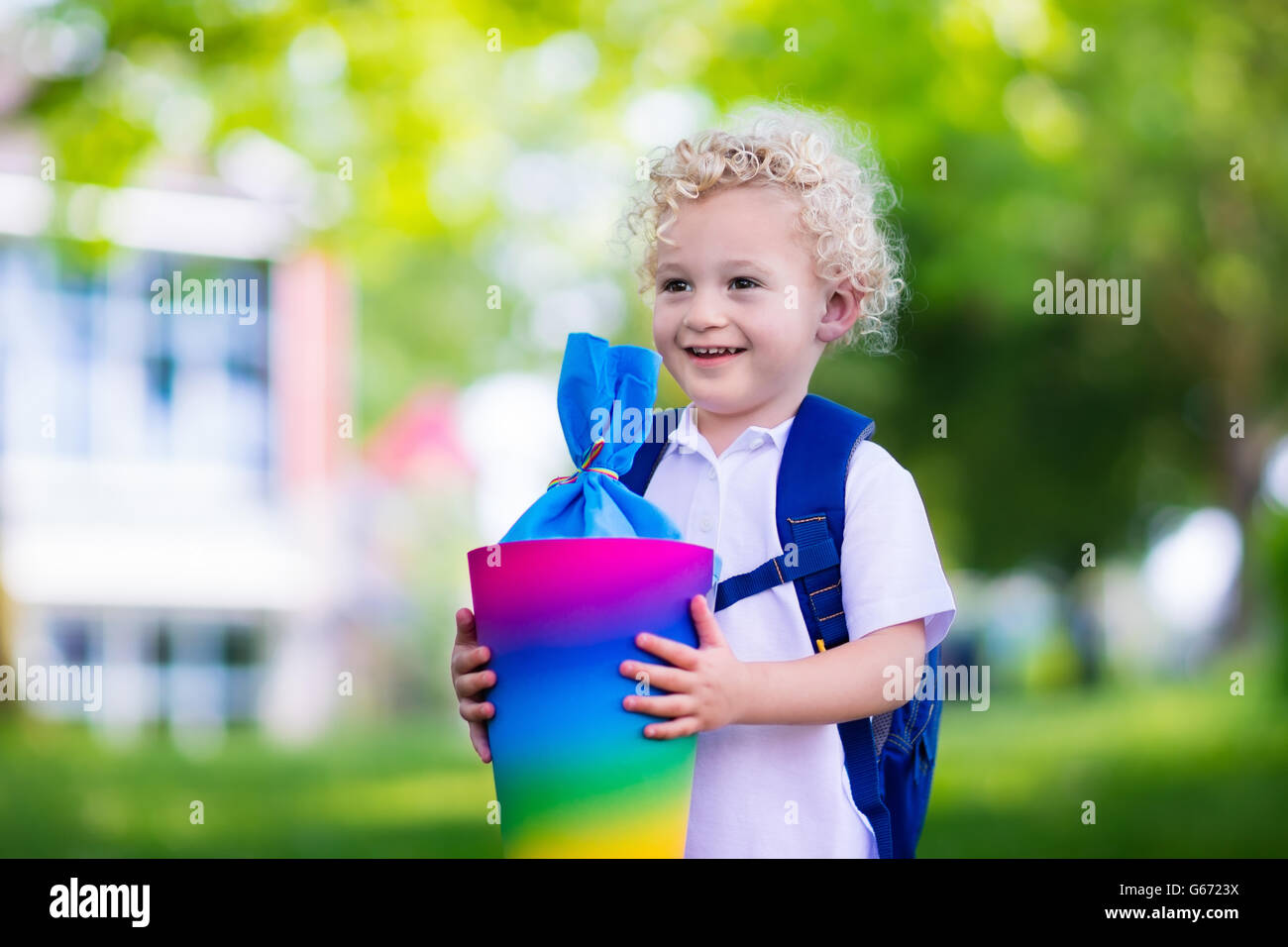 Happy child holding traditional German candy cone on first school day ...