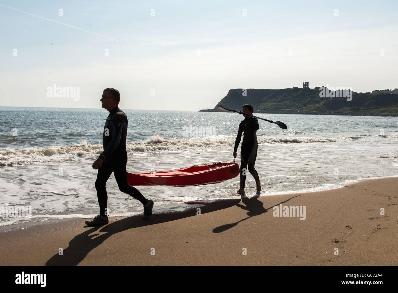 Rob Fewster-Noble and his son Adam (aged 13) on a beach in Scarborough ...