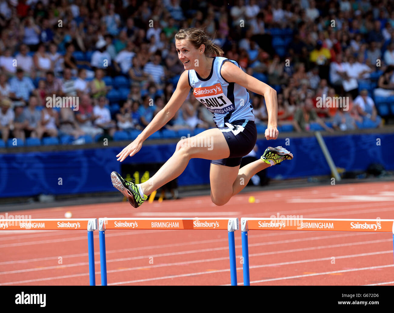 Mandy Gault runs in her heat of the Womens 400m Hurdles during the ...