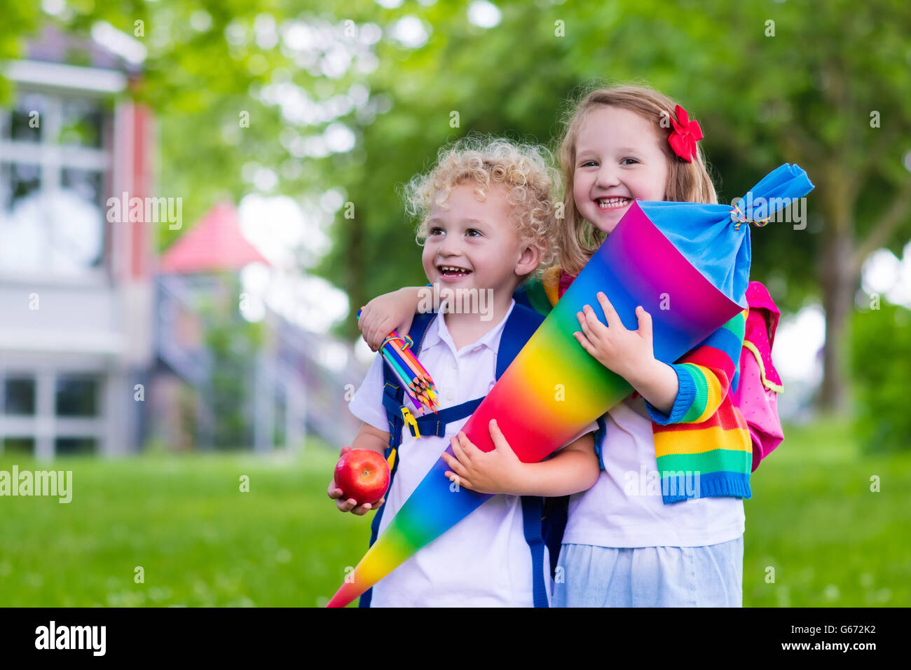 Happy child holding traditional German candy cone on first school day ...