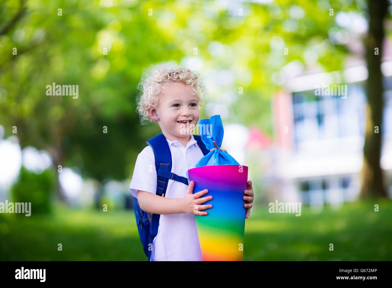 Happy child holding traditional German candy cone on first school day ...