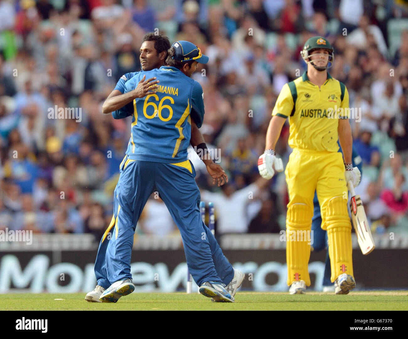 Sri Lanka's captain Angelo Matthews (left) celebrates bowling out ...