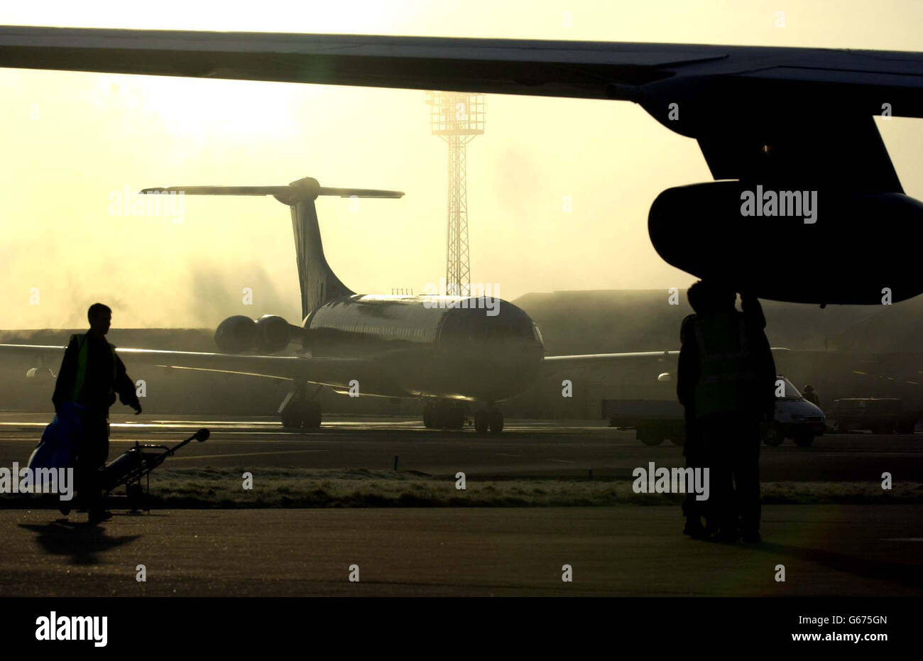 Refuelling pod (right foreground) on a VC 10 is checked before ...