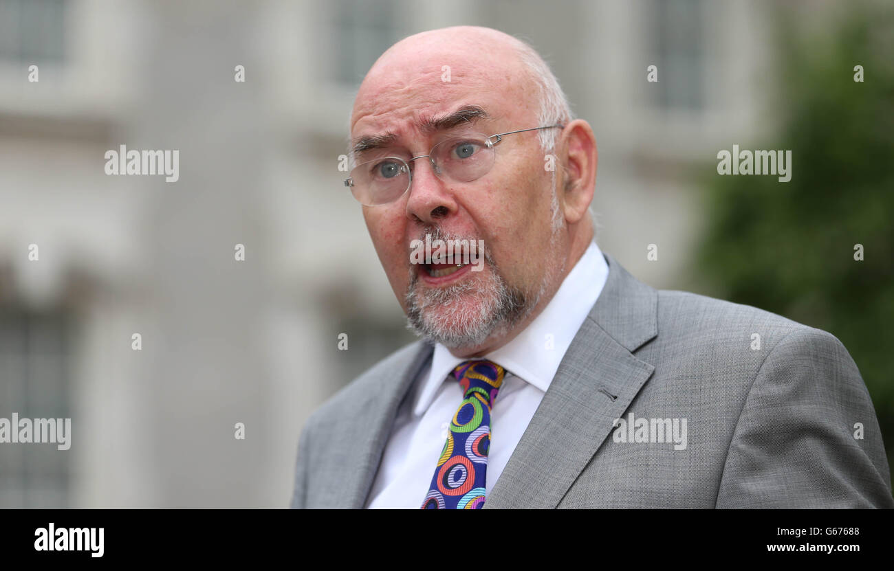 Education Minister Ruairi Quinn speaks to the media during a press ...