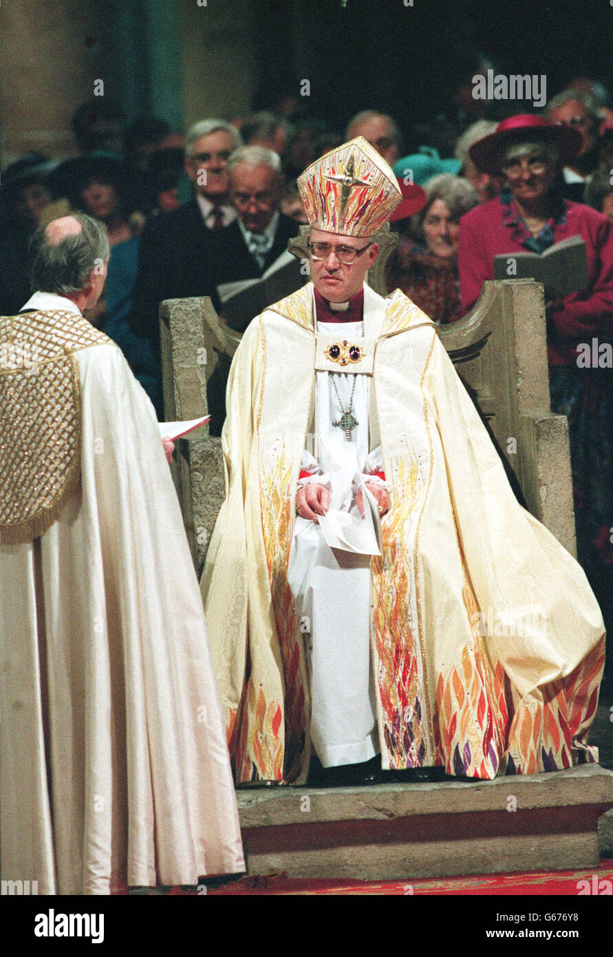 The Archbishop of Cantebury, Dr George Carey, is installed in the chair ...