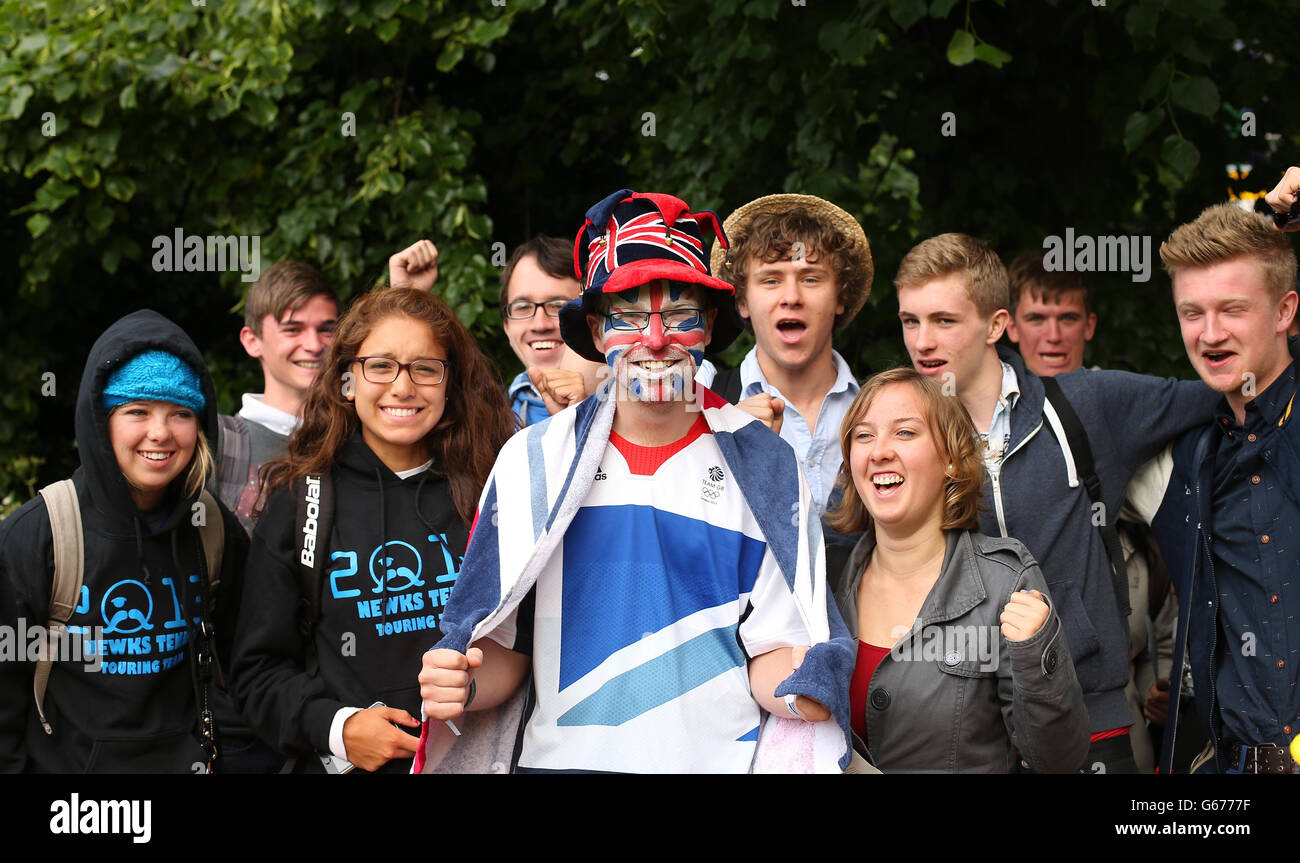Tennis fan Jonathan Golding (centre) from London waits in the queue ...