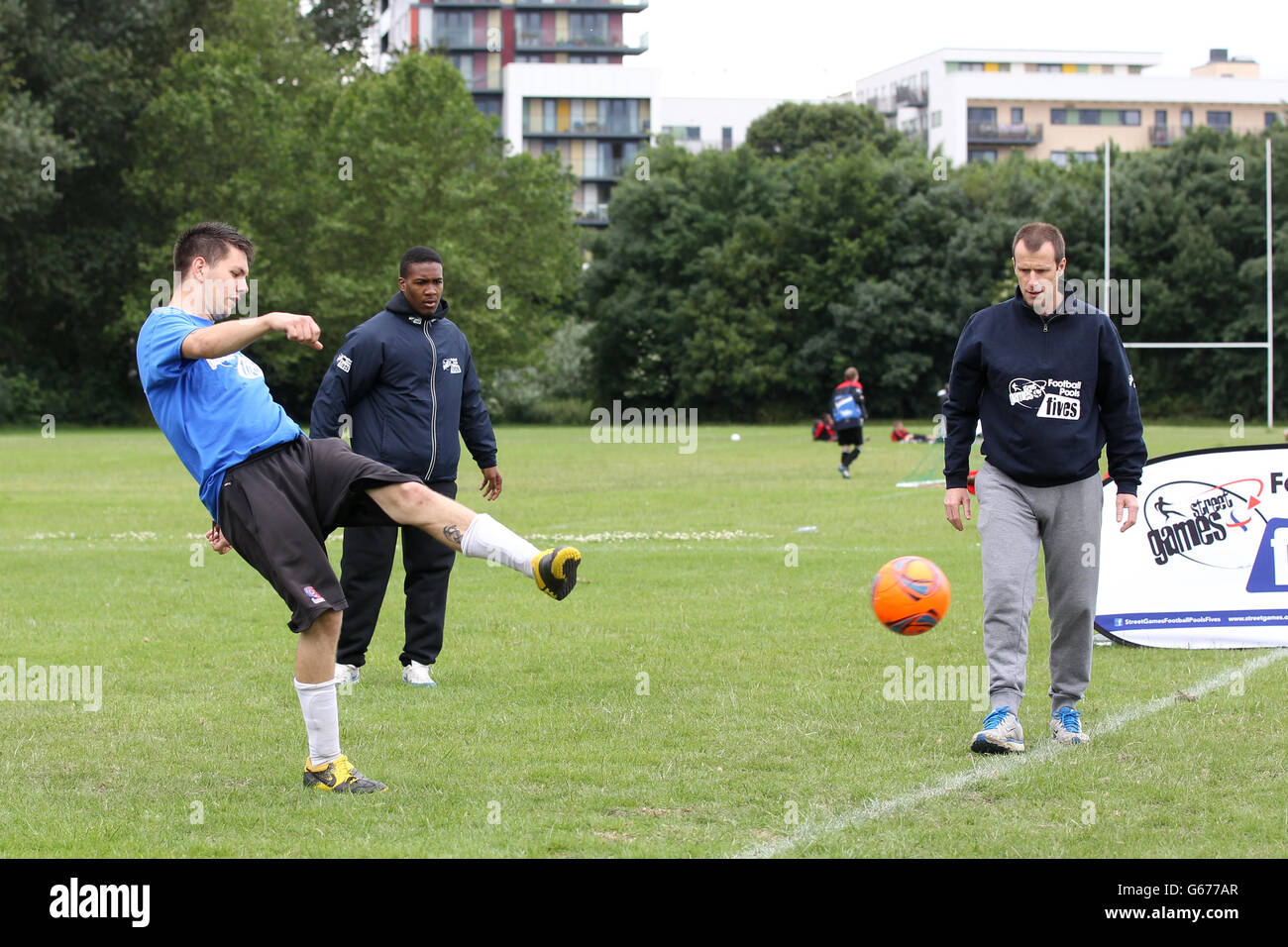 Steve Claridge (right) and Leeds United's Dominic Poleon watch the ...