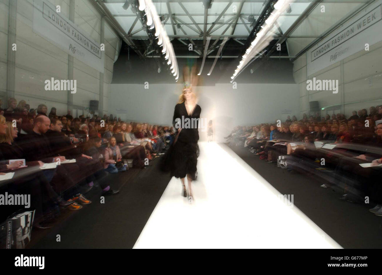 A model wears a design by fashion designer John Rocha during his autumn ...