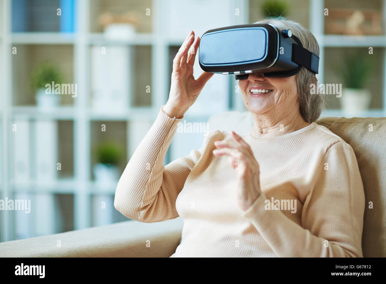 Granny with modern technology Stock Photo - Alamy