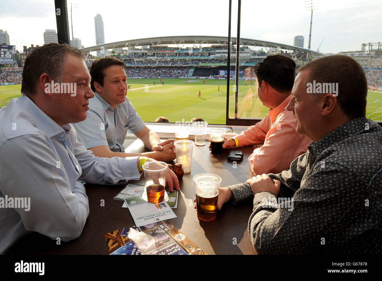 Spectators enjoying hospitality hi-res stock photography and images - Alamy