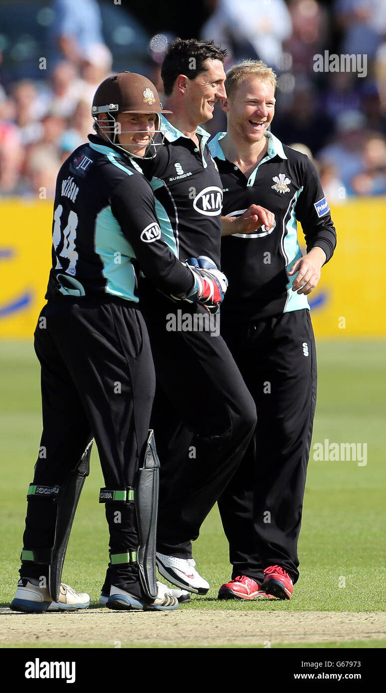 Surrey's (left-right) Gary Wilson, Jon Lewis and Gareth Batty celebrate ...