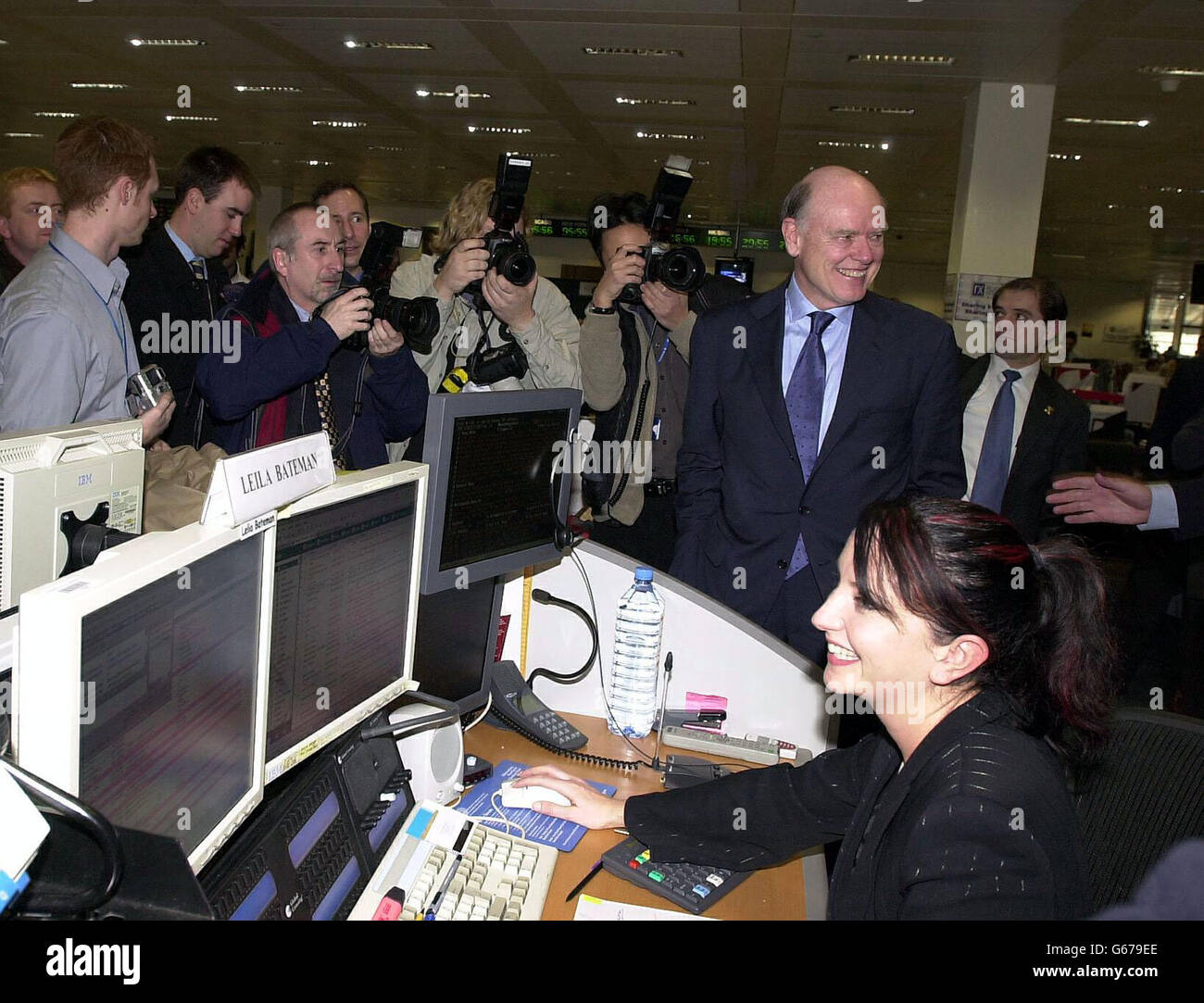 US Treasury Secretary, John Snow touring the trading floor of the ...