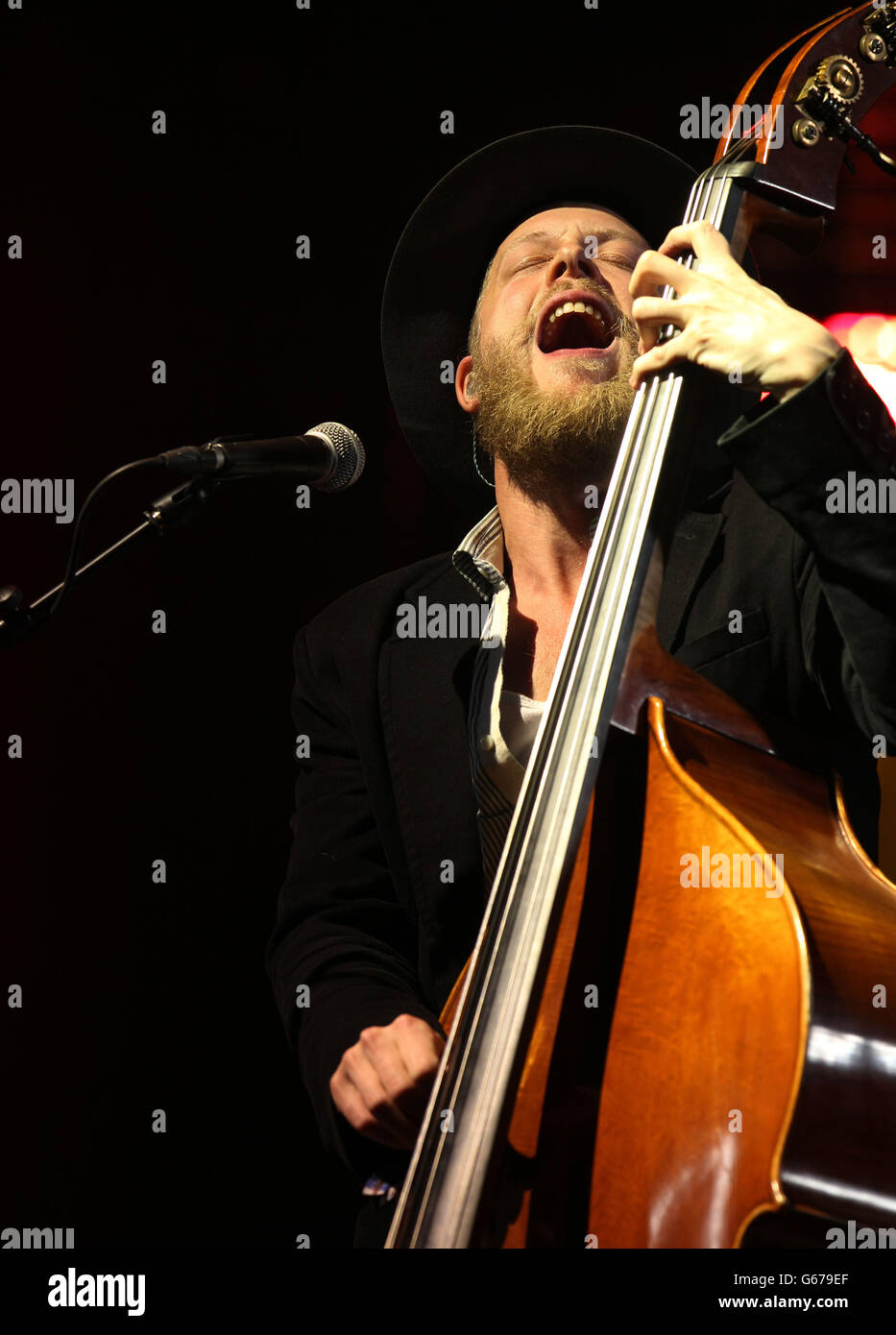 Ted Dwane, of Mumford & Sons, performing on the Pyramid Stage at the ...