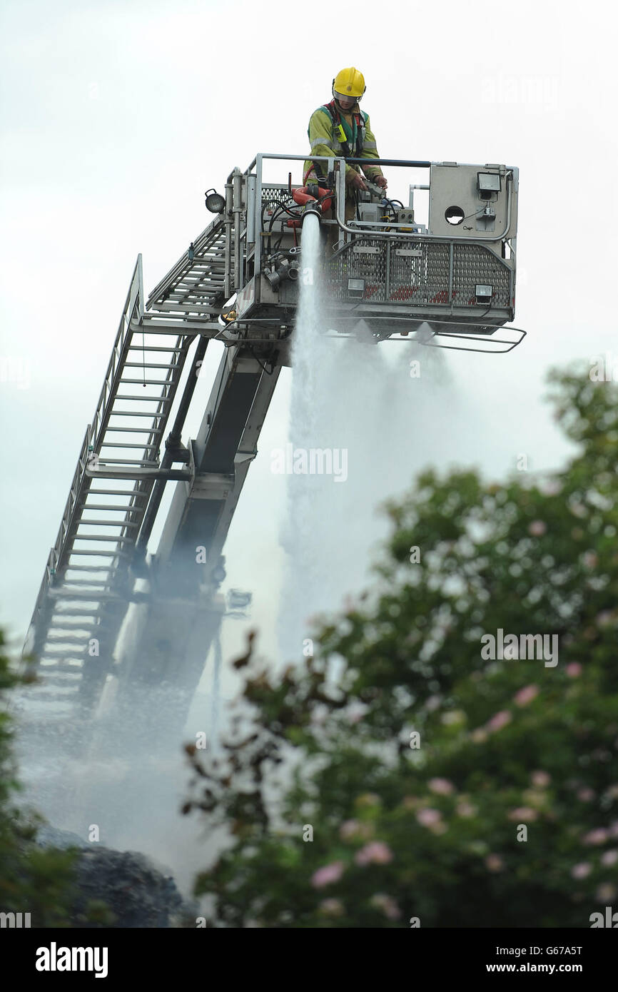 Firefighter uses hydraulic platform during fire at young in smethwick ...