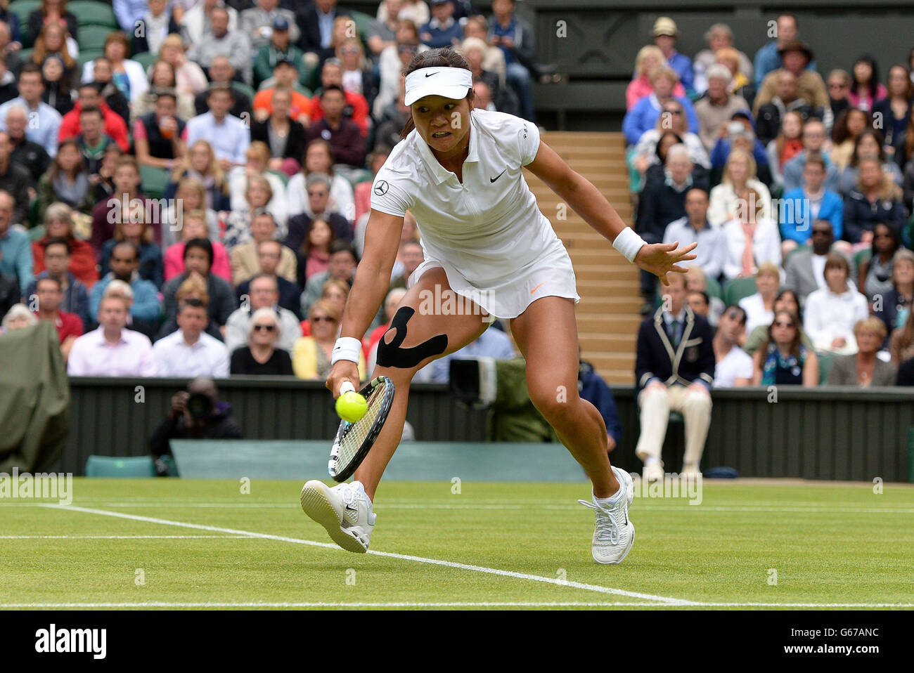 China's Na Li in action against Poland's Agnieszka Radwanska during day ...