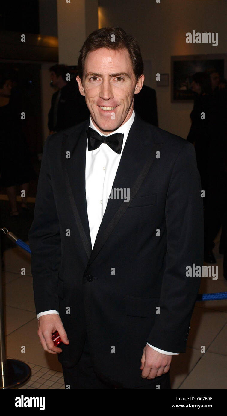 Comedian rob arriving for the orange british academy film bafta hi-res ...