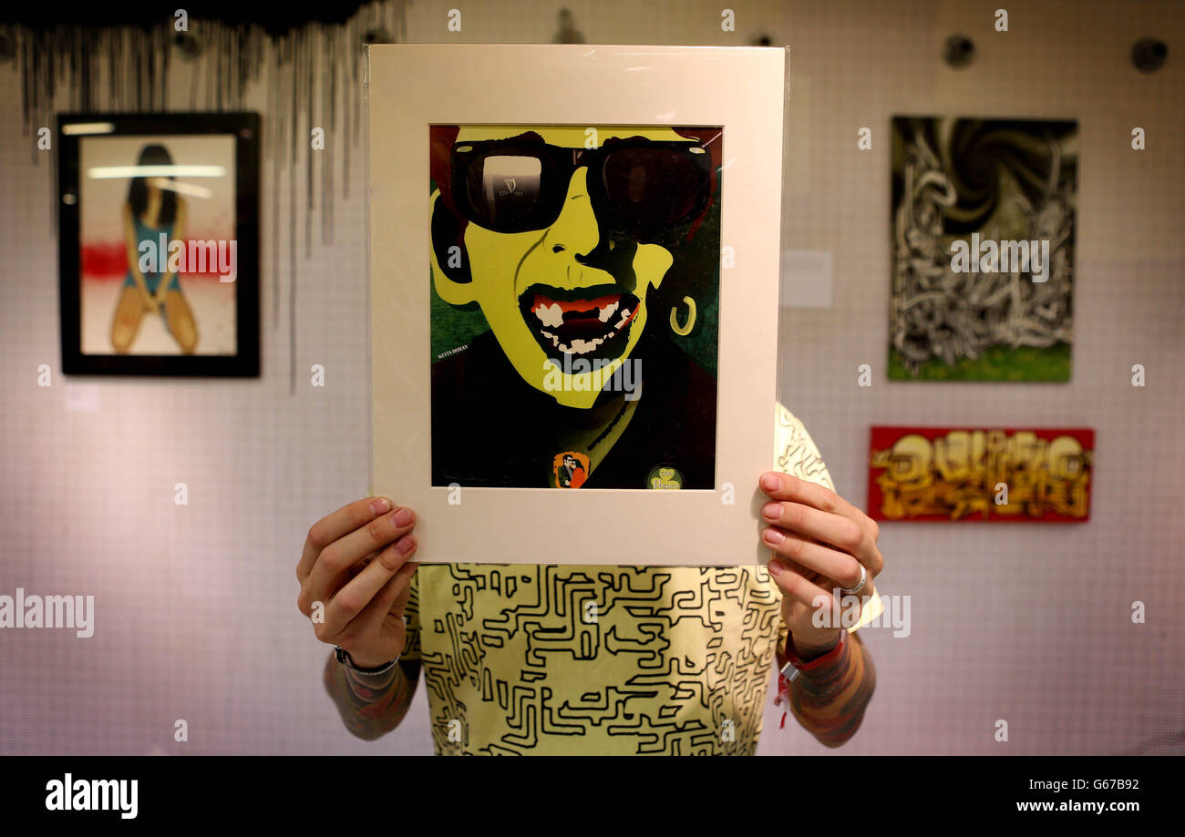 A portrait of Irish singer Shane McGowan by artist Kevin Bohan is hung ...