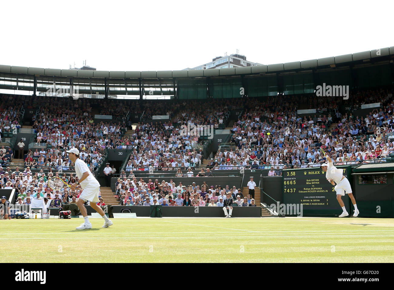 USA's Bob and Mike Bryan (far court) in action against India's Rohan ...