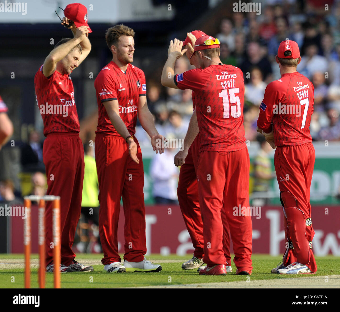 Lancashire Lightning's Arron Lilley (2 L) celebrates after he takes the ...