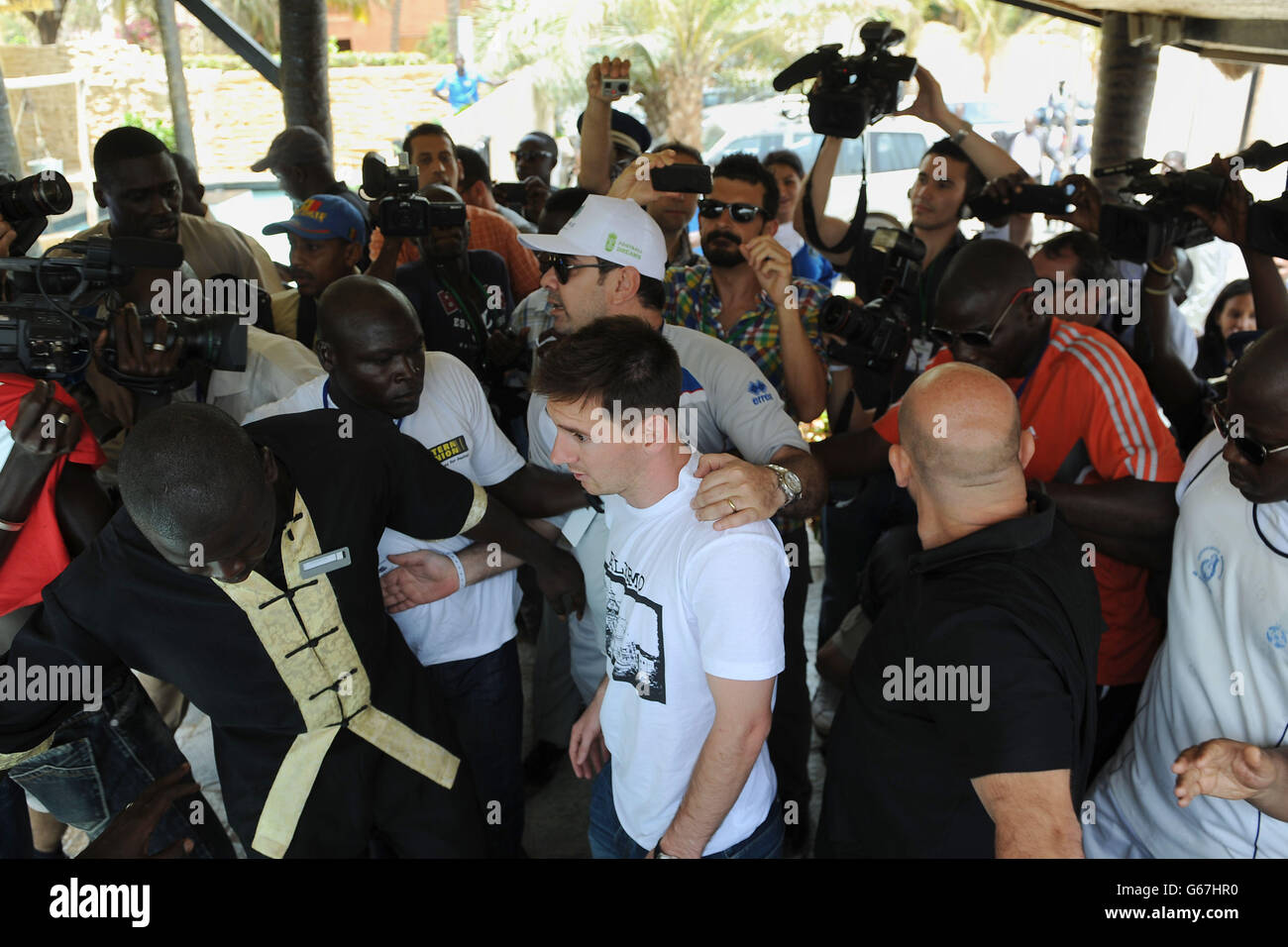 Argentina and Barcelona star Lionel Messi is mobbed by international ...