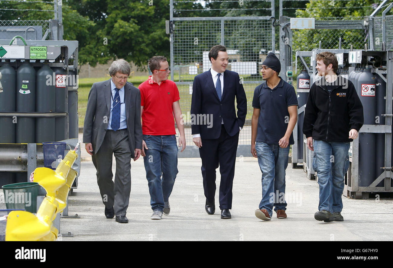 Chancellor George Osborne speaks with (left to right), Alan Bond ...