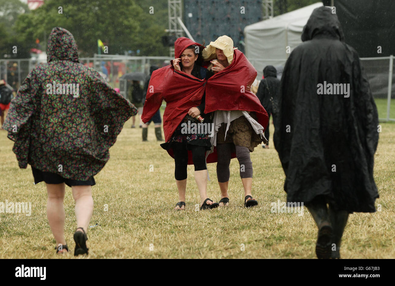 Glastonbury Festival 2013 Day 2 Festival Goers During A Rain Shower