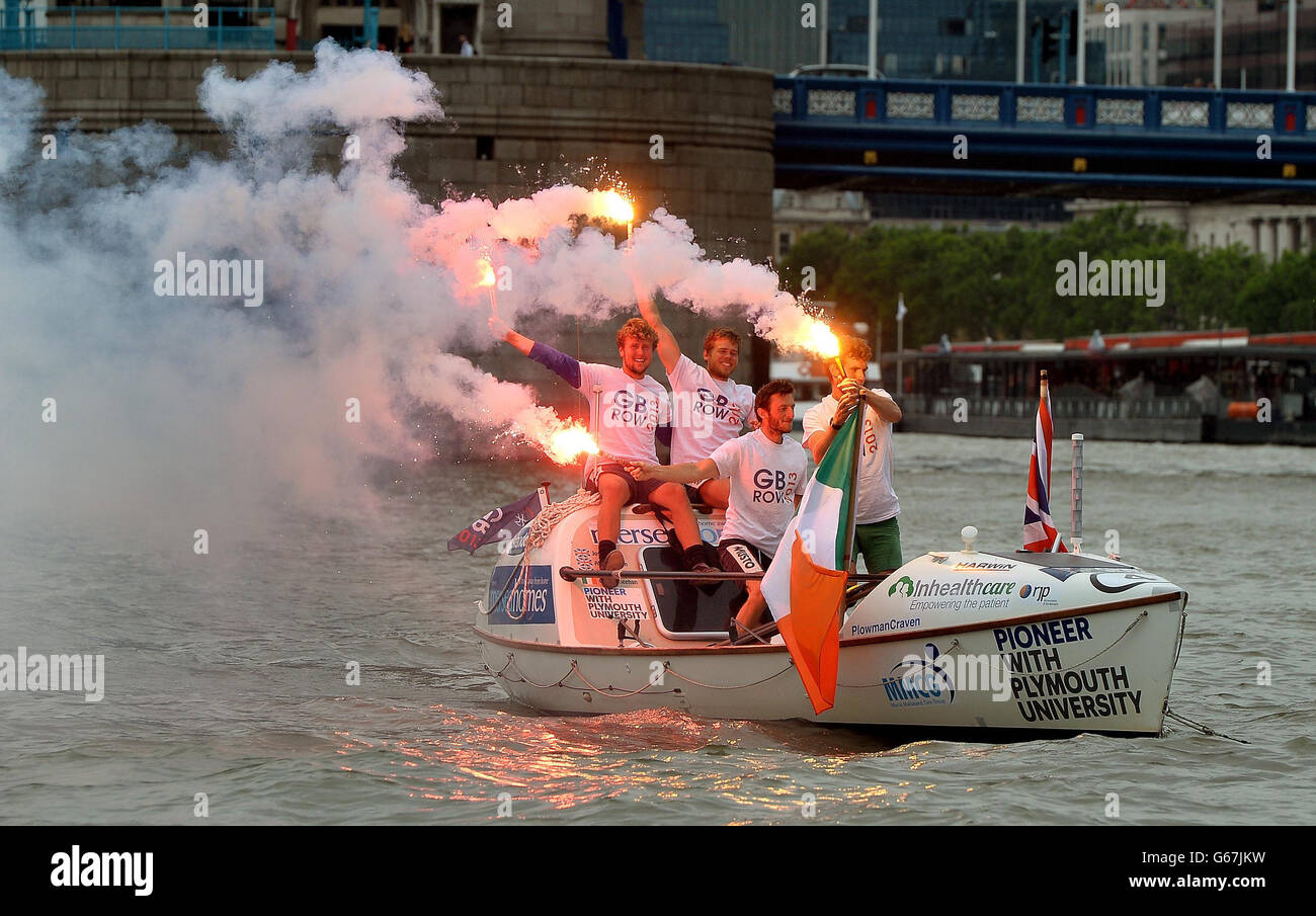 The four around britain rowers let off flares hi-res stock photography ...
