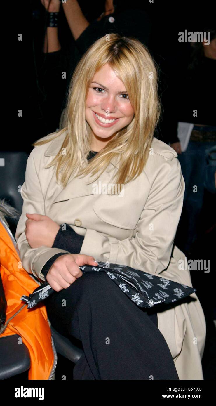 Billie Piper watches the Boyd autumn/winter 2003 collection show as ...