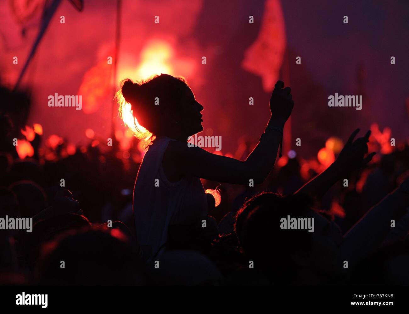 Flares in the crowd as the Rolling Stones perform on the Pyramid Stage ...