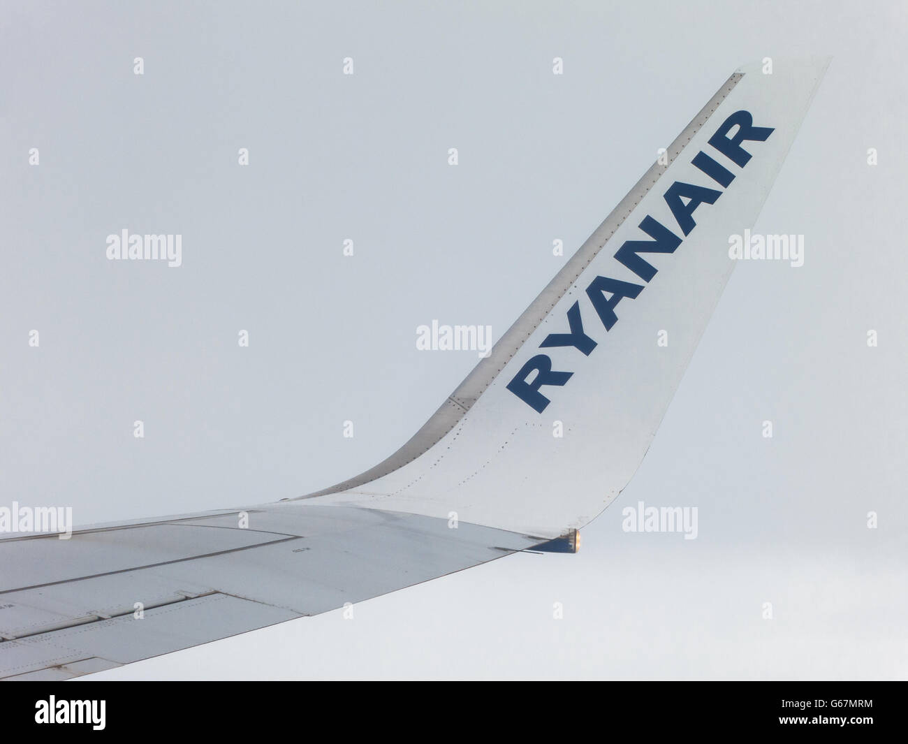 Ryanair wing detail, airplane in flight Stock Photo - Alamy