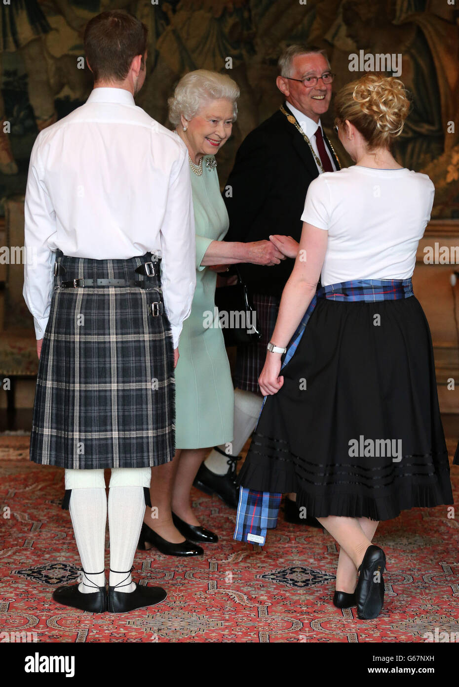 Queen Elizabeth II, who is Patron of the Royal Country Dance Society ...