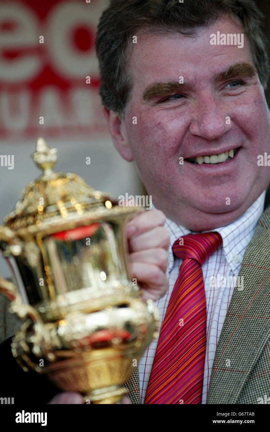 Owner of race winner Shotgun Willy, Graham Roach, celebrates after his ...