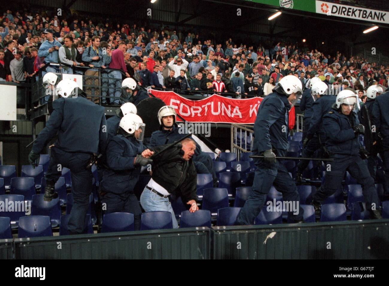 Dutch riot police deal with german hooligans hi-res stock photography ...