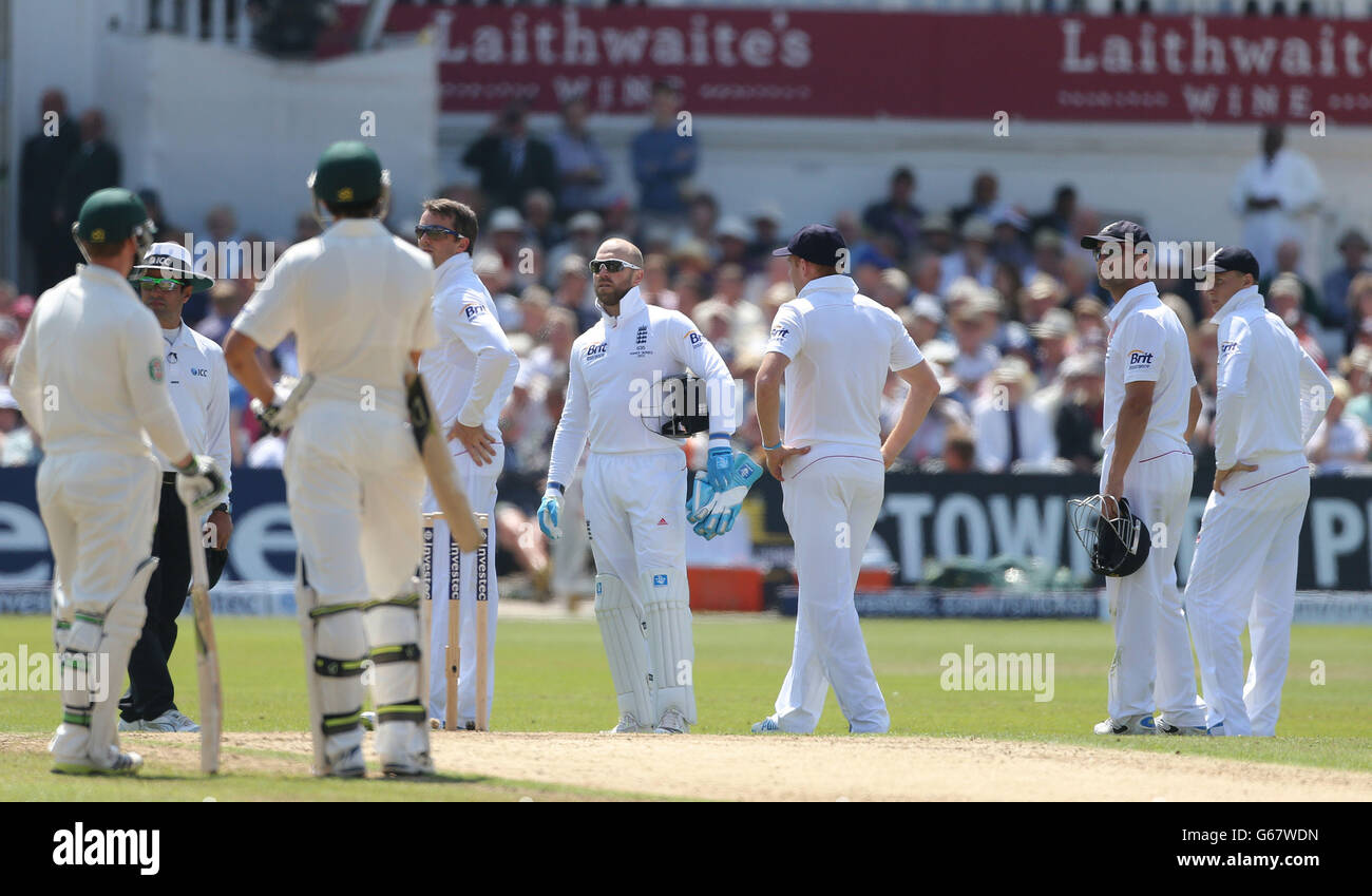 England wicketkeeper Matthew Prior and bowler Graeme Swann watch the TV ...