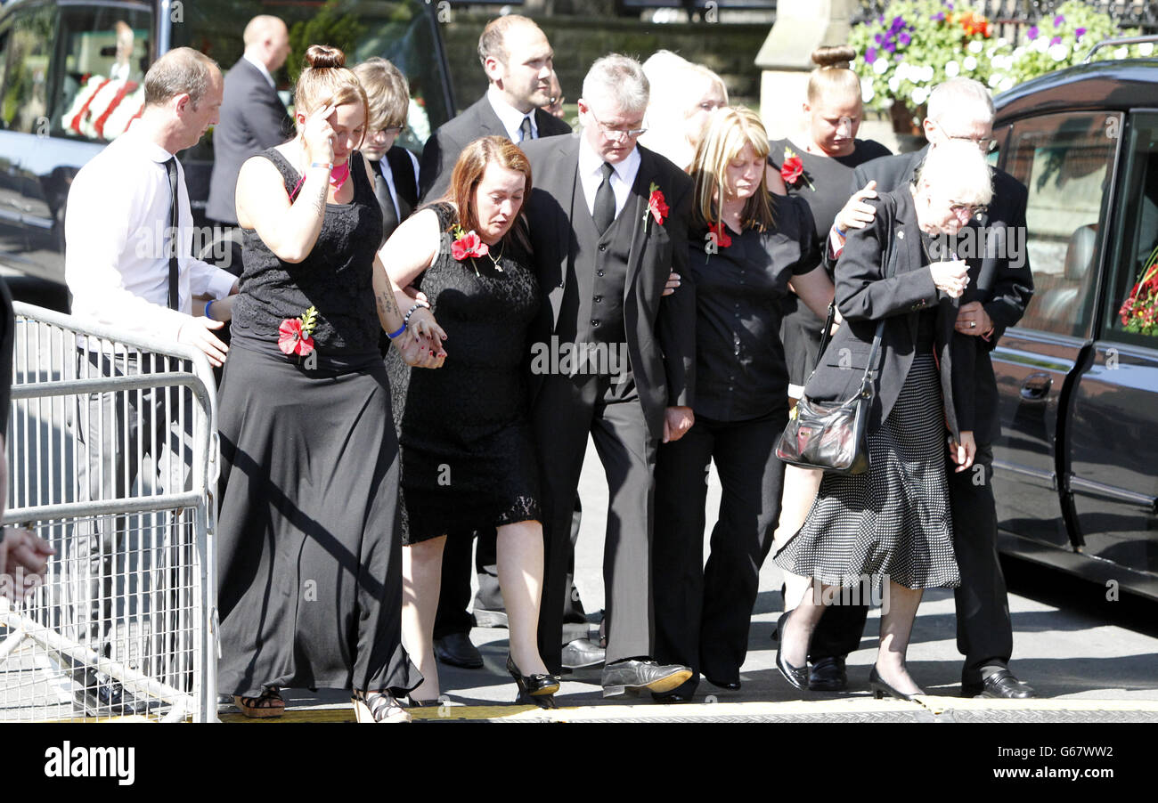 Mourners arrive at Bury Parish church in Greater Manchester, for a ...