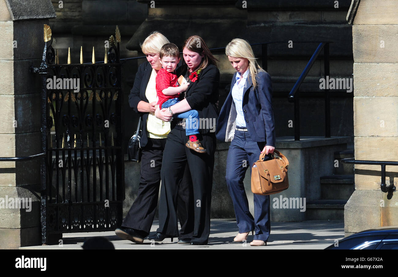 Rebecca Rigby carries her son Jack alongside her mother Susan Metcalfe ...