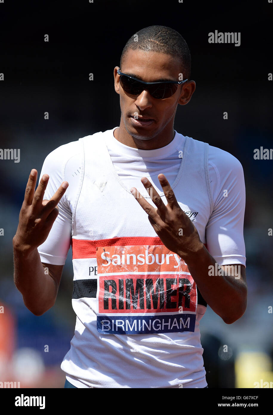 Michael Rimmer holds up his hands to signify his six Victories at the ...